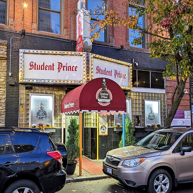 The iconic Student Prince exterior beckons with its vintage marquee, a beacon of Bavarian hospitality standing proud on Fort Street since 1935.