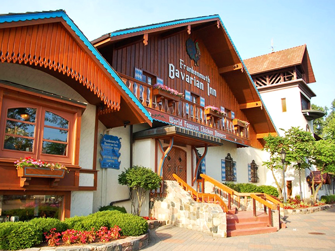 The Bavarian Inn stands like a postcard from Munich that somehow landed in Michigan, complete with clock tower and flower boxes that scream "Willkommen!"