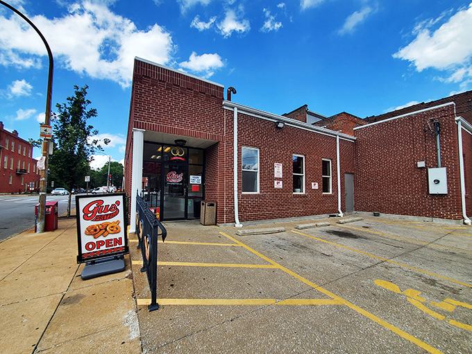 The unassuming brick exterior of Gus' Pretzel Shop stands like a carb-lover's Fortress of Solitude, quietly promising twisted delights within.
