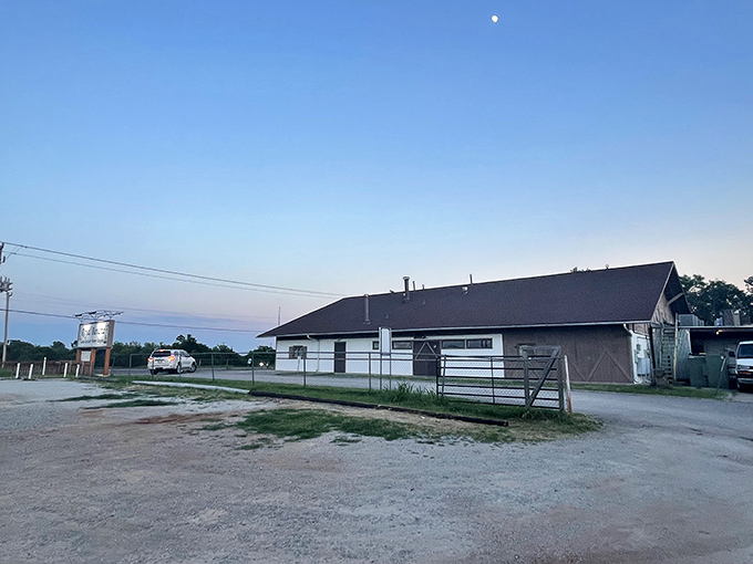 Bavaria meets Oklahoma in this charming Alpine-style exterior. The white stucco and dark wooden beams promise authentic German delights within.
