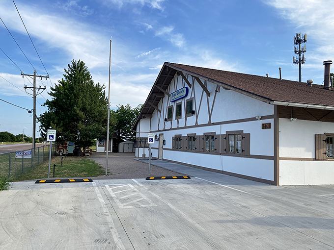 Bavaria meets Oklahoma in this charming Alpine-style exterior. The white stucco and dark wooden beams promise authentic German delights within.