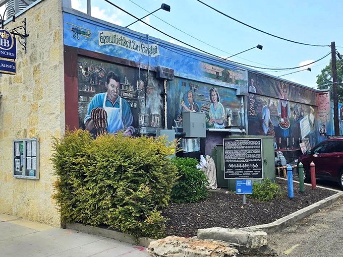 The exterior mural tells you everything: this isn't just a restaurant, it's a cultural time capsule where German heritage meets Texas hospitality.