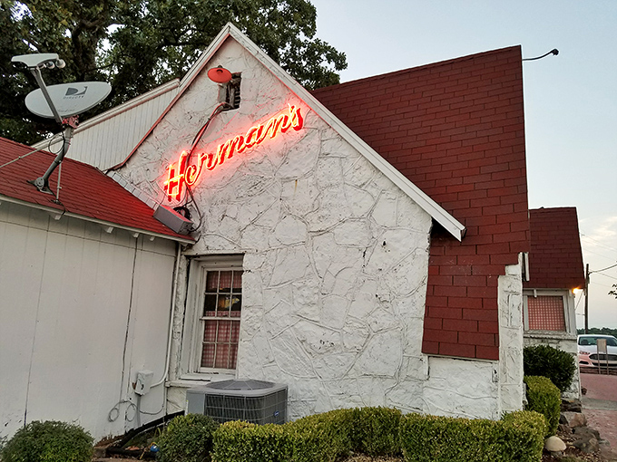 The unassuming white cottage exterior of Herman's Ribhouse is Arkansas's version of a culinary TARDIS &ndash; modest outside, magnificent within.