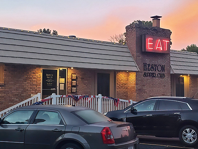 The unassuming exterior of Heston Supper Club beckons like an old friend, promising comfort and satisfaction behind its wooden facade.