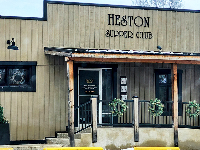 The unassuming exterior of Heston Supper Club beckons like an old friend, promising comfort and satisfaction behind its wooden facade.