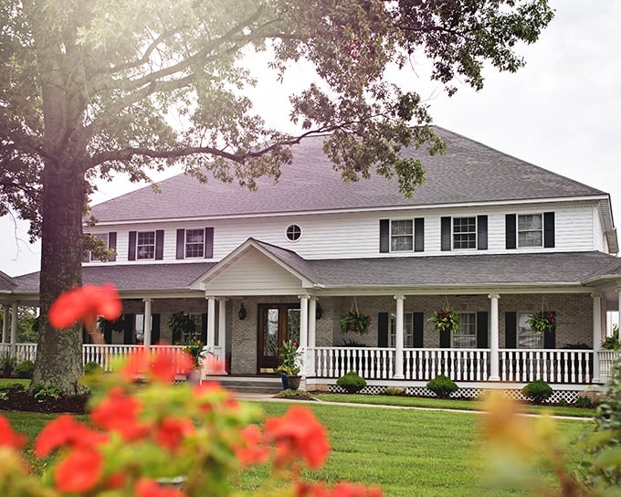 The stately white colonial exterior of Sybill's Saint James welcomes you like a friend who happens to have impeccable taste and a killer prime rib recipe.