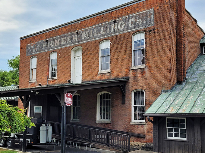 History you can taste! The iconic brick exterior of Pioneer Mill stands as a delicious time capsule in Tiffin, where flour-making heritage meets modern culinary magic.