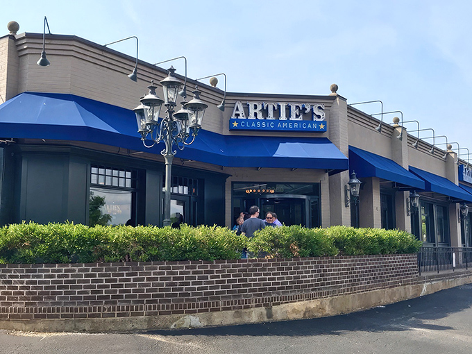 Artie's classic blue awnings and elegant exterior welcome you like an old friend who happens to make the best prime rib in Virginia.