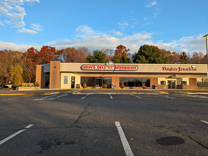 The iconic Rein's Deli sign glows like a Broadway marquee in Connecticut, promising New York flavors without the traffic or attitude.