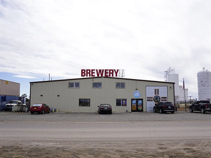 The ultimate "don't judge a book by its cover" moment. This unassuming metal building houses liquid gold under that brilliant New Mexico sky.