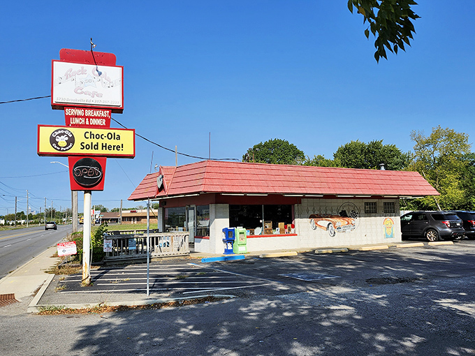 Welcome to time travel central! Rock-Cola's distinctive red roof and vintage car mural aren't just decoration&mdash;they're your first clue you've stumbled upon something special on Indy's east side.