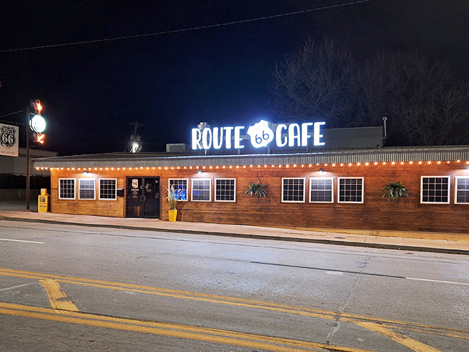 The weathered wooden exterior of Route 66 Cafe stands like a time capsule on Clinton's main drag, beckoning hungry travelers with promises of home cooking and nostalgia.