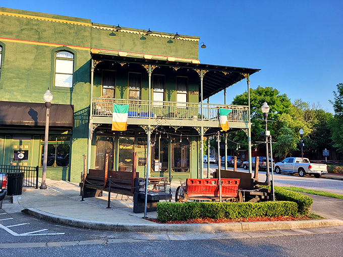 The emerald jewel of downtown Opelika stands proudly with its distinctive green fa&ccedil;ade and inviting balcony. Irish flags flutter in the Alabama breeze, promising authentic Celtic hospitality with Southern charm.