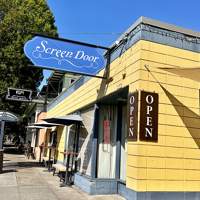 The iconic blue sign against a cheerful yellow exterior says it all: culinary treasures await inside this Portland institution.