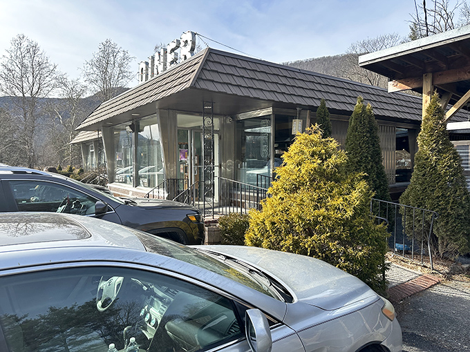 The unassuming roadside exterior of Phoenicia Diner belies the culinary magic happening inside. Like finding a Broadway show in a barn, this Catskills gem promises delicious surprises.