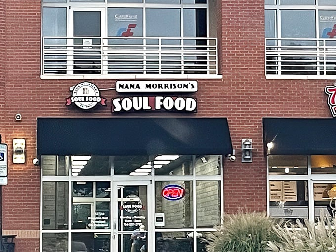 The welcoming storefront of Nana Morrison's Soul Food beckons hungry travelers with its classic brick facade and bold signage. Soul food salvation awaits inside.
