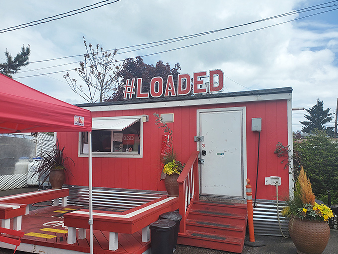 The bright red food cart with "#LOADED" emblazoned on top isn't just a name&mdash;it's a promise that's gloriously kept with every order.