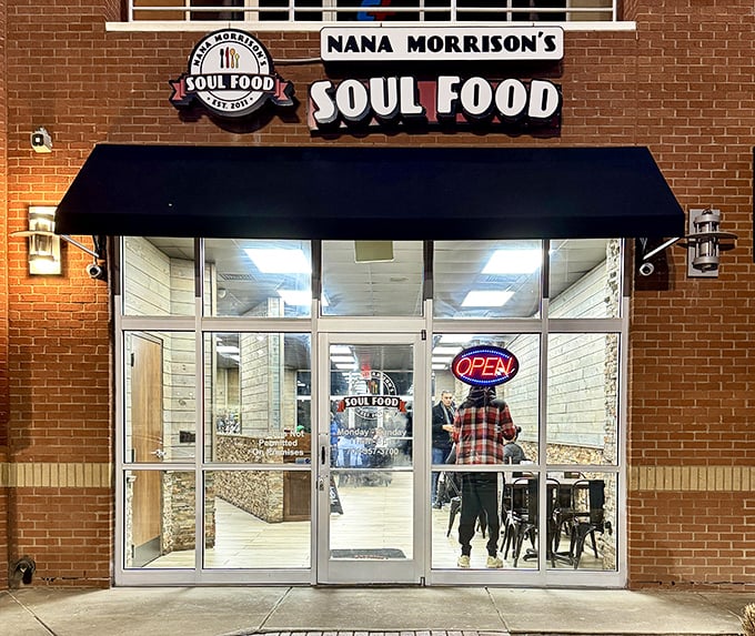 The welcoming storefront of Nana Morrison's Soul Food beckons hungry travelers with its classic brick facade and bold signage. Soul food salvation awaits inside.