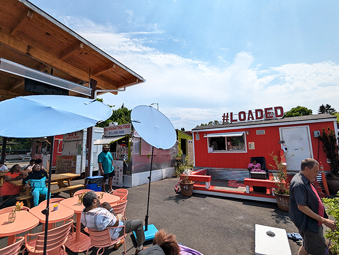 The bright red food cart with "#LOADED" emblazoned on top isn't just a name&mdash;it's a promise that's gloriously kept with every order.
