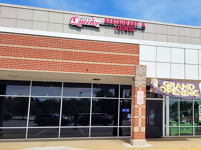 The modern brick-and-glass exterior of Boss Queens might look unassuming, but inside awaits a soul food revelation worth crossing state lines for.