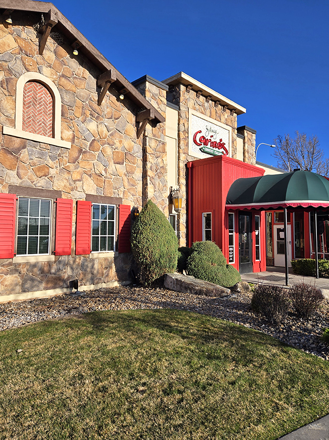 Tuscan dreams come true in Ammon! The stone facade and vibrant landscaping make this pasta paradise feel like a European getaway in eastern Idaho.