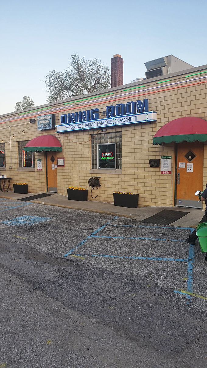 The vintage "TAVERN" sign beckons pasta pilgrims to this unassuming yellow-brick building that's been feeding Indianapolis longer than most of us have been hungry.