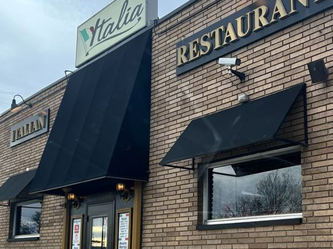 The unassuming brick exterior of Yarusso Bros stands like a culinary fortress, promising Italian treasures within. No fancy frills needed when the food speaks volumes.