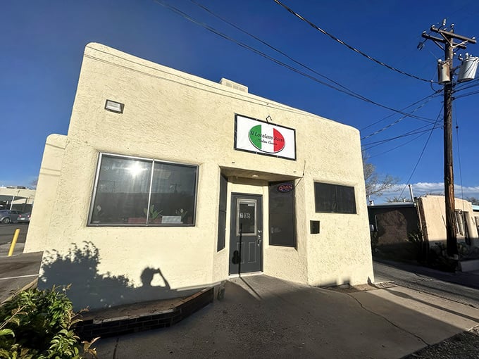 The unassuming adobe exterior of Il Localetto Rossi proves once again that culinary treasures often hide behind the most modest facades.
