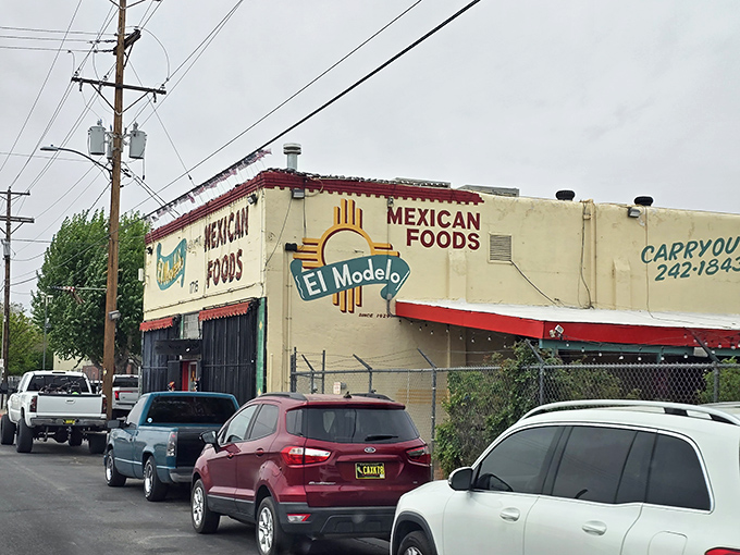 The unassuming turquoise and white facade of El Modelo stands like a culinary lighthouse in Albuquerque's Barelas neighborhood, beckoning hungry souls for generations.