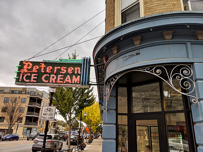 That neon sign doesn't just advertise ice cream&mdash;it's a beacon of hope on a tough day and a promise of something wonderful around that curved corner entrance.