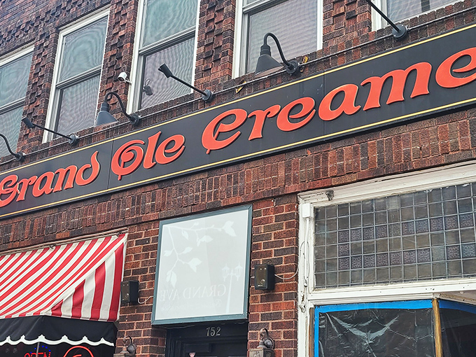The iconic brick fa&ccedil;ade of Grand Ole Creamery, with its vintage striped awnings and neon ice cream cone sign, beckons sweet-toothed pilgrims from across Minnesota.