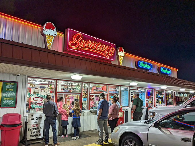 The classic red and white exterior of Spencer's Dairy Kream stands as a beacon of sweet nostalgia in Grenada, promising frozen delights that have stood the test of time.
