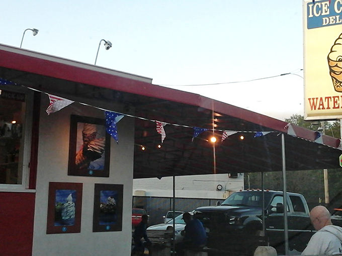 The classic roadside ice cream stand lives on! Ice Cream Delight's vintage sign and red awning promise sweet relief from Delaware's summer heat.