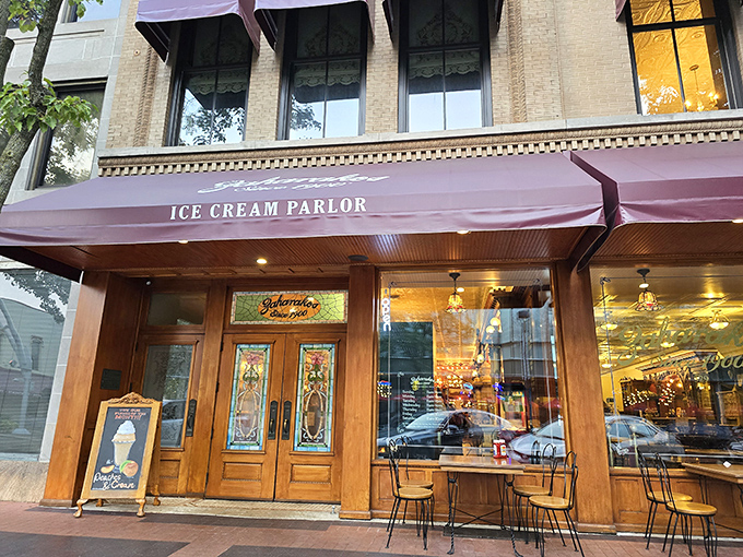 Step back in time with Zaharakos' stunning wooden fa&ccedil;ade &ndash; where the red awnings aren't just decorative, they're practically inviting you in for a sweet escape.