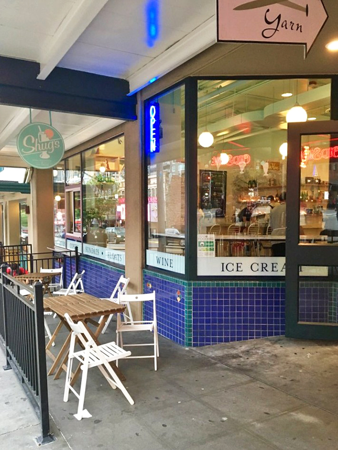 The mint-green sign beckons like a lighthouse for sweet-tooth sailors. Shug's classic storefront promises "SUNDAES FLOATS" in lettering that screams "your diet ends here."