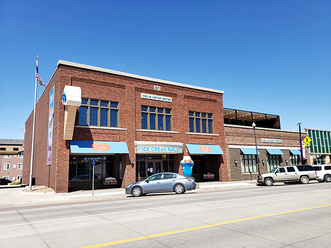 The brick fa&ccedil;ade of Wells Visitor Center stands proudly in downtown Le Mars, with that giant ice cream cone sculpture practically winking at passersby.