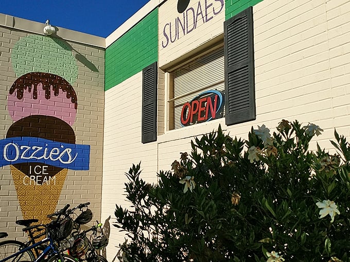 The brilliant blue sign of Ozzie's against white brick is like a beacon for ice cream lovers&mdash;simplicity that promises sweet perfection inside.