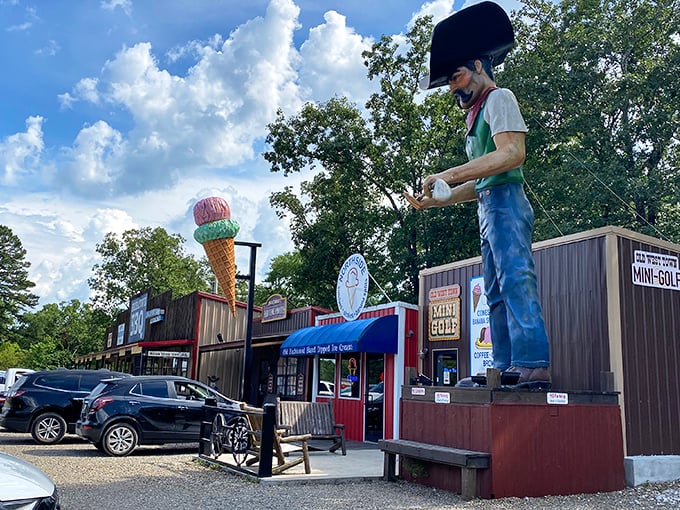 The cowboy statue and giant ice cream cone aren't just landmarks&mdash;they're sentinels guarding the gateway to frozen paradise in Broken Bow.