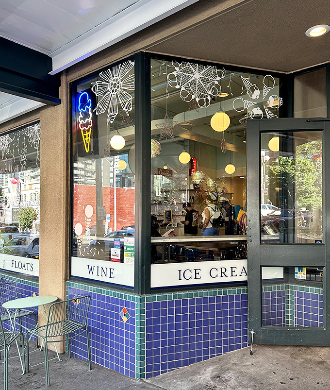 The mint-green sign beckons like a lighthouse for sweet-tooth sailors. Shug's classic storefront promises "SUNDAES FLOATS" in lettering that screams "your diet ends here."