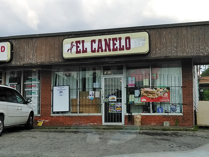 The unassuming strip mall exterior of Taqueria El Paso might not scream "culinary destination," but that's how the best food treasures stay hidden from the masses.