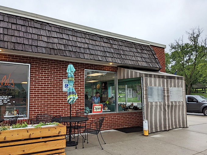 The iconic orange "FOOD" sign has been guiding hungry Nebraskans to Harold's Koffee House for generations, a beacon of comfort in Florence's historic district.