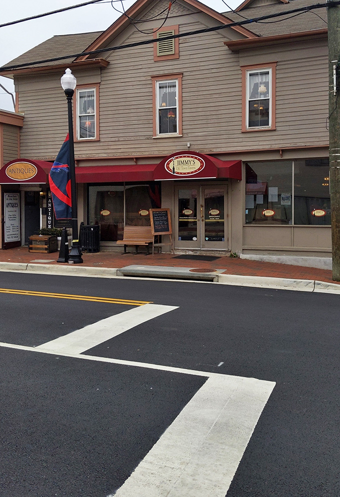 The red awning beckons like a lighthouse for hungry travelers. Jimmy's promise to treat "Everyone Like A Regular" isn't just a slogan—it's their delicious reality.