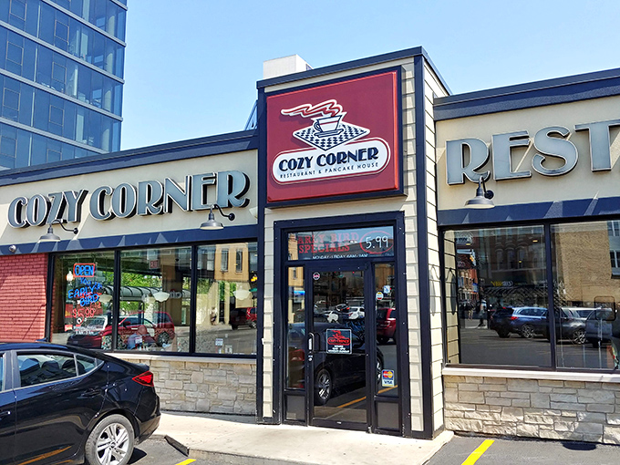 The unassuming storefront of Cozy Corner stands like a beacon of breakfast hope on Milwaukee Avenue, promising pancake salvation to hungry Chicagoans.