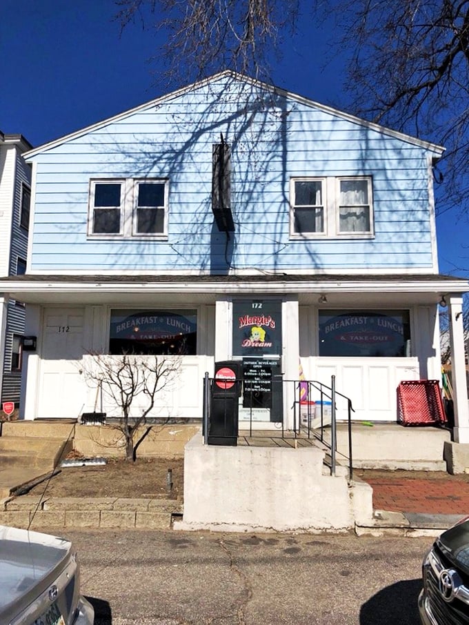 The iconic blue exterior of Margie's Dream Diner stands like a beacon of breakfast hope against the New Hampshire sky. Small building, big flavors.