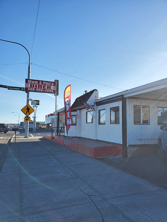 The unassuming exterior of Mom and Pop's Diner stands like a beacon of breakfast hope in Moses Lake, promising culinary treasures within its humble walls.