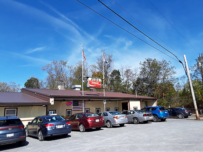 Mom's Place announces itself with no-nonsense charm – colorful signs promising pepperoni rolls, beef BBQ, and other delights that make your stomach growl in anticipation.