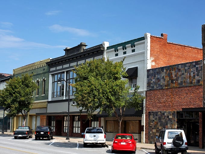 Vintage cars line Gadsden's Broad Street like a time-traveling car show, where yesterday's chrome beauties meet today's treasure hunters.