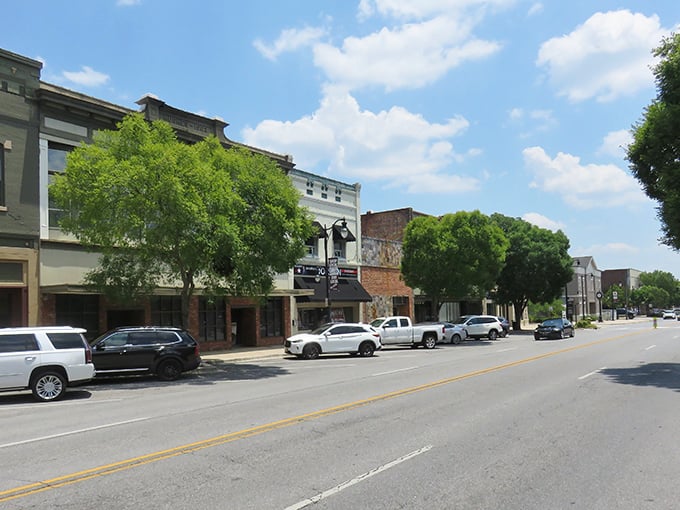 Vintage cars line Gadsden's Broad Street like a time-traveling car show, where yesterday's chrome beauties meet today's treasure hunters.