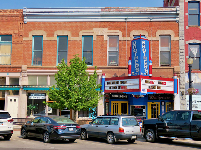 Historic brick buildings line Main Street in Cañon City, where Pizza Madness offers a slice of local flavor amid architecture that whispers tales of Colorado's past.
