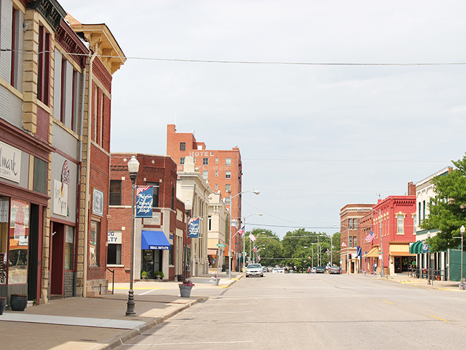 Downtown Abilene's historic brick buildings stand like sentinels of time, with the iconic green Trapp Drug sign beckoning visitors to step back into a simpler era.
